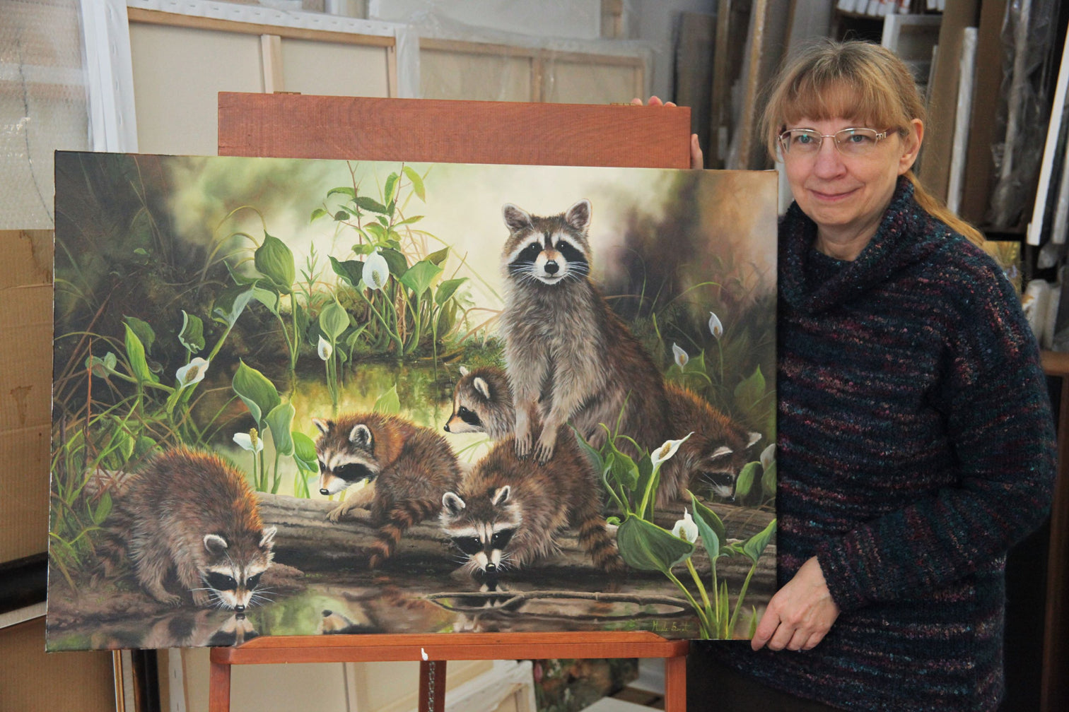 Famille de ratons laveurs et callas des marais – Société Art et Science ...